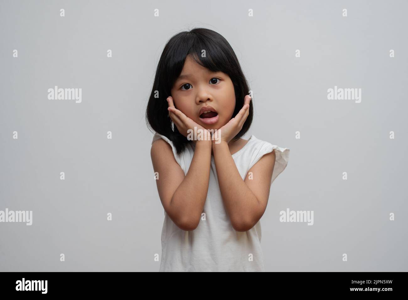 Portrait of Asian child 5 year old and to collect hair and Place her ...