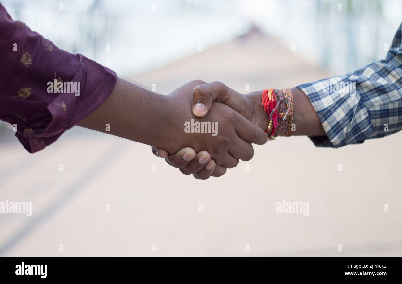 Friends shake hands. Closeup . Friendship handshake outdoor Stock Photo ...