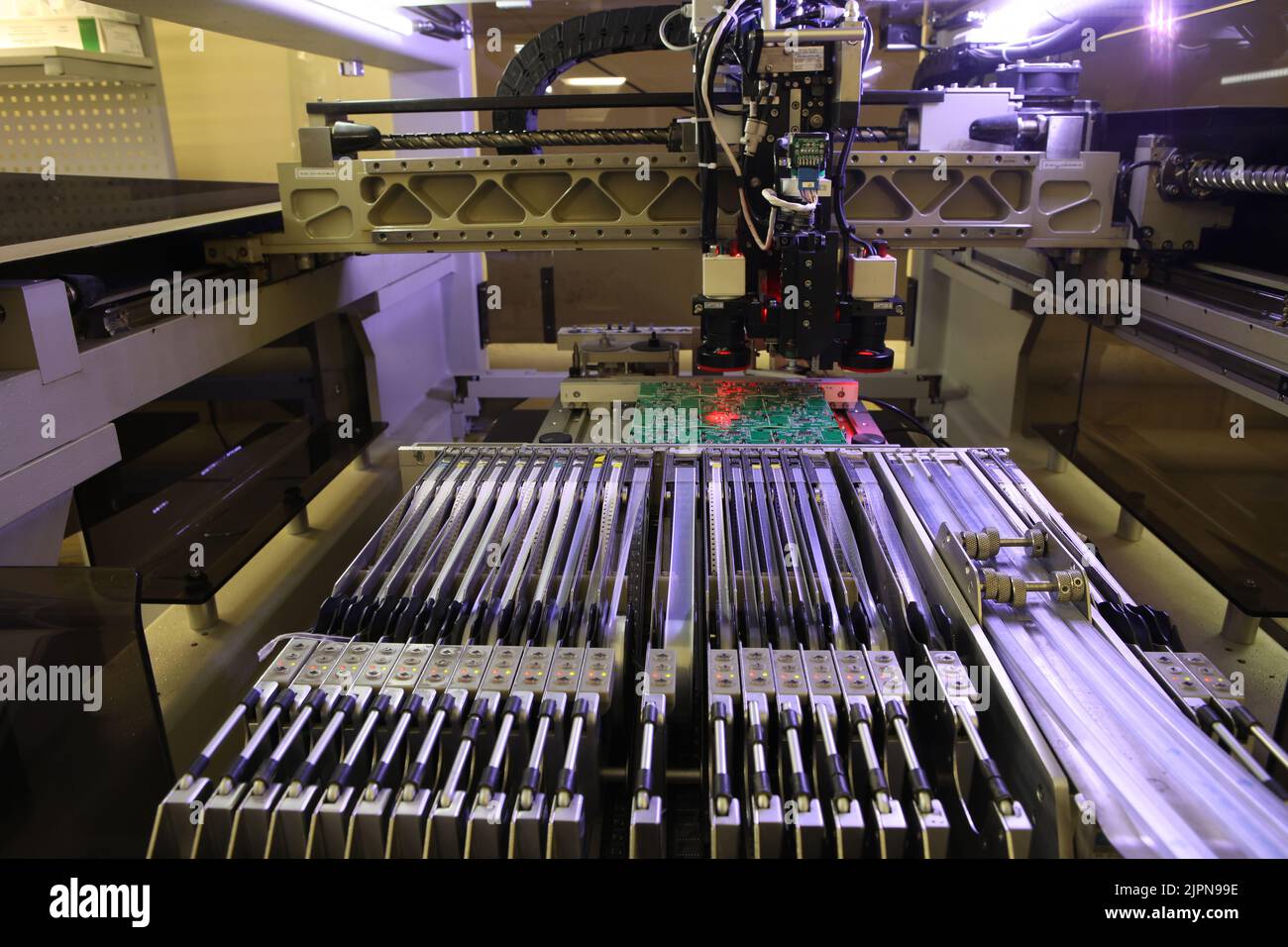 Installer of SMD parts on boards and soldering parts. Machine for ...