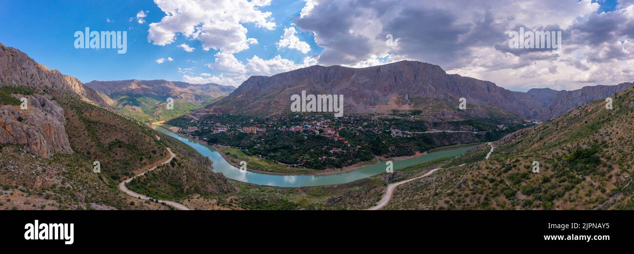 Valley view of Kemaliye town. View of the old Kemaliye houses and the ...