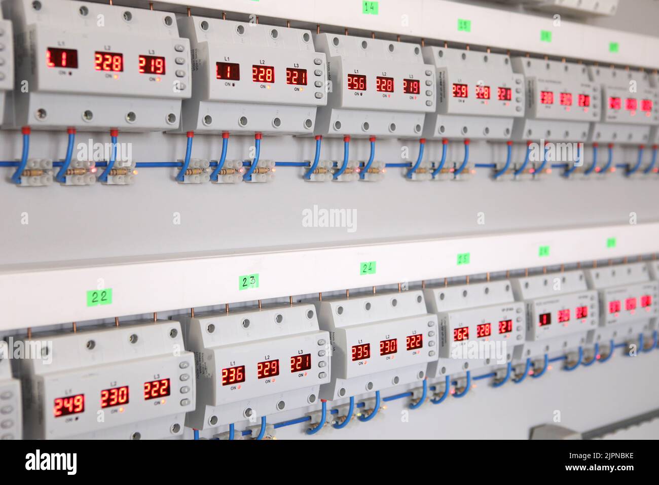 Service center for the repair of power voltage relays. Human checking ...
