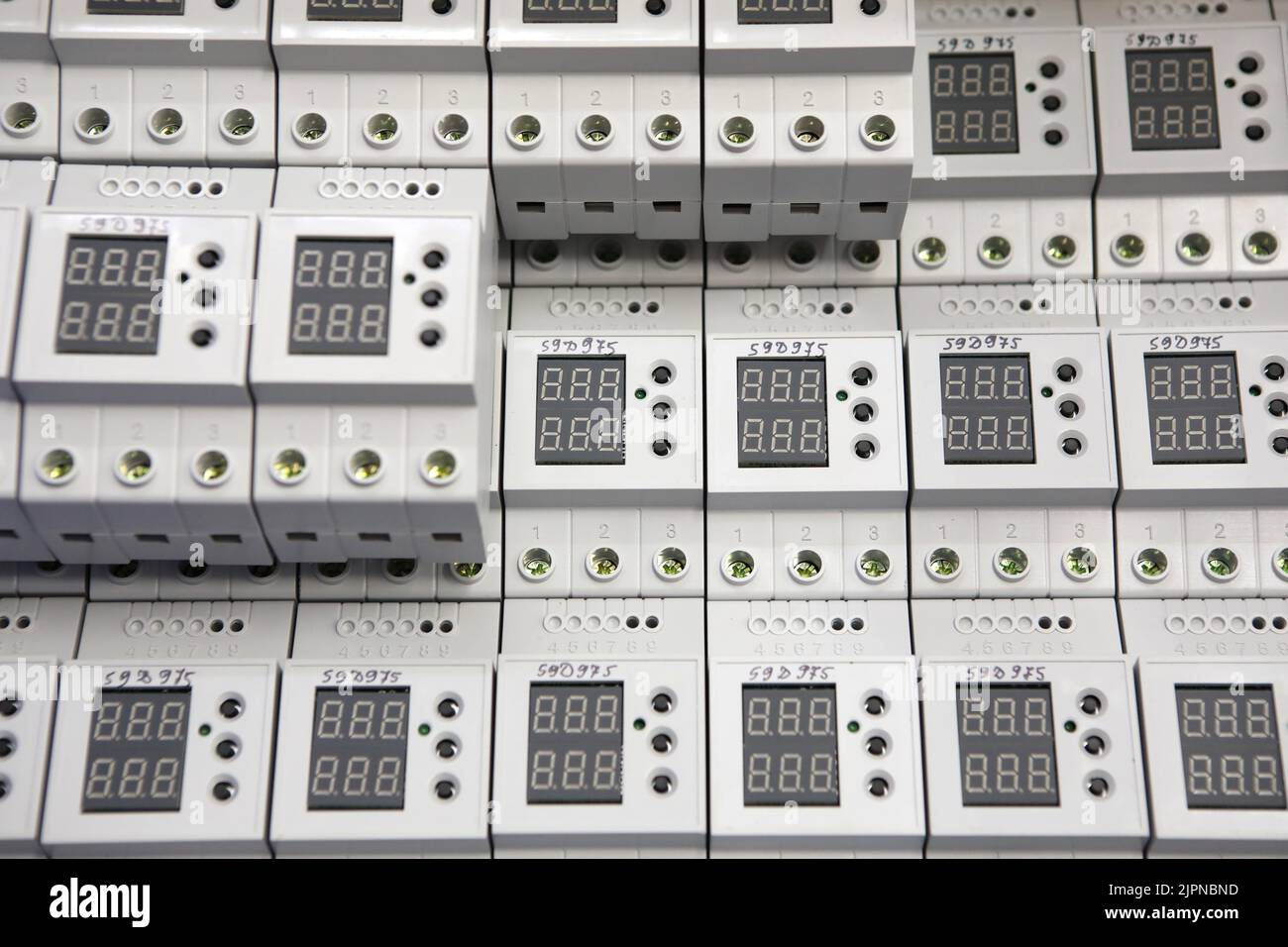 Service center for the repair of power voltage relays. Human checking ...