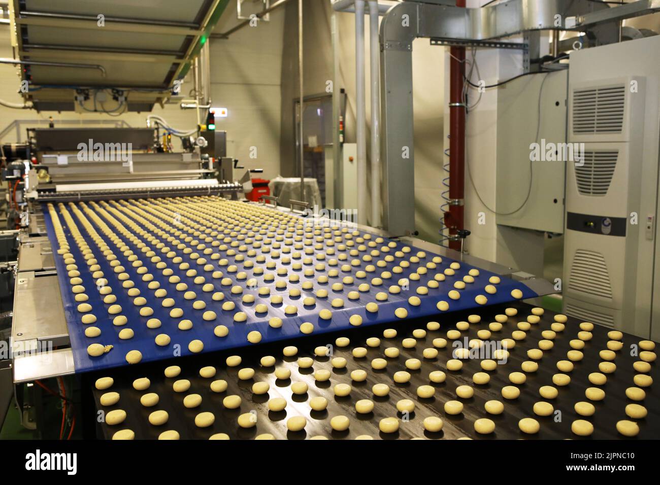 Controlling the work of huge conveyor machine producing spice cakes at ...