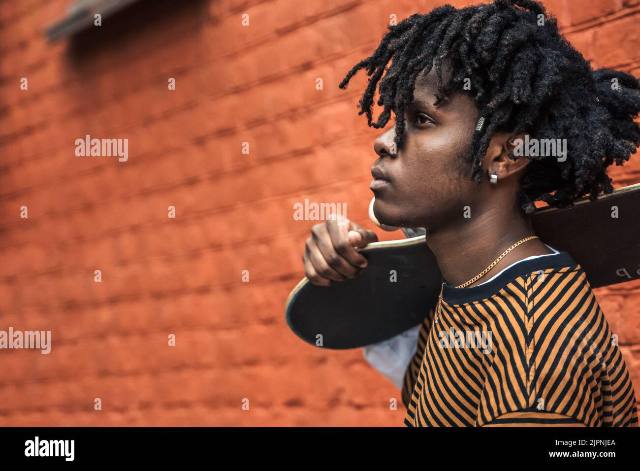 Black man with dreadlocks hi-res stock photography and images - Alamy