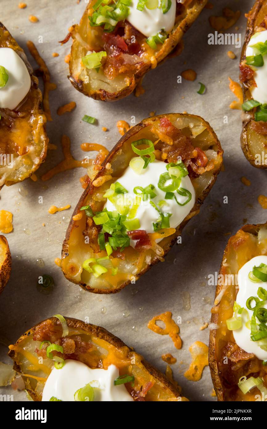 Homemade Loaded Crispy Potato Skins with Sour Cream and Bacon Stock ...