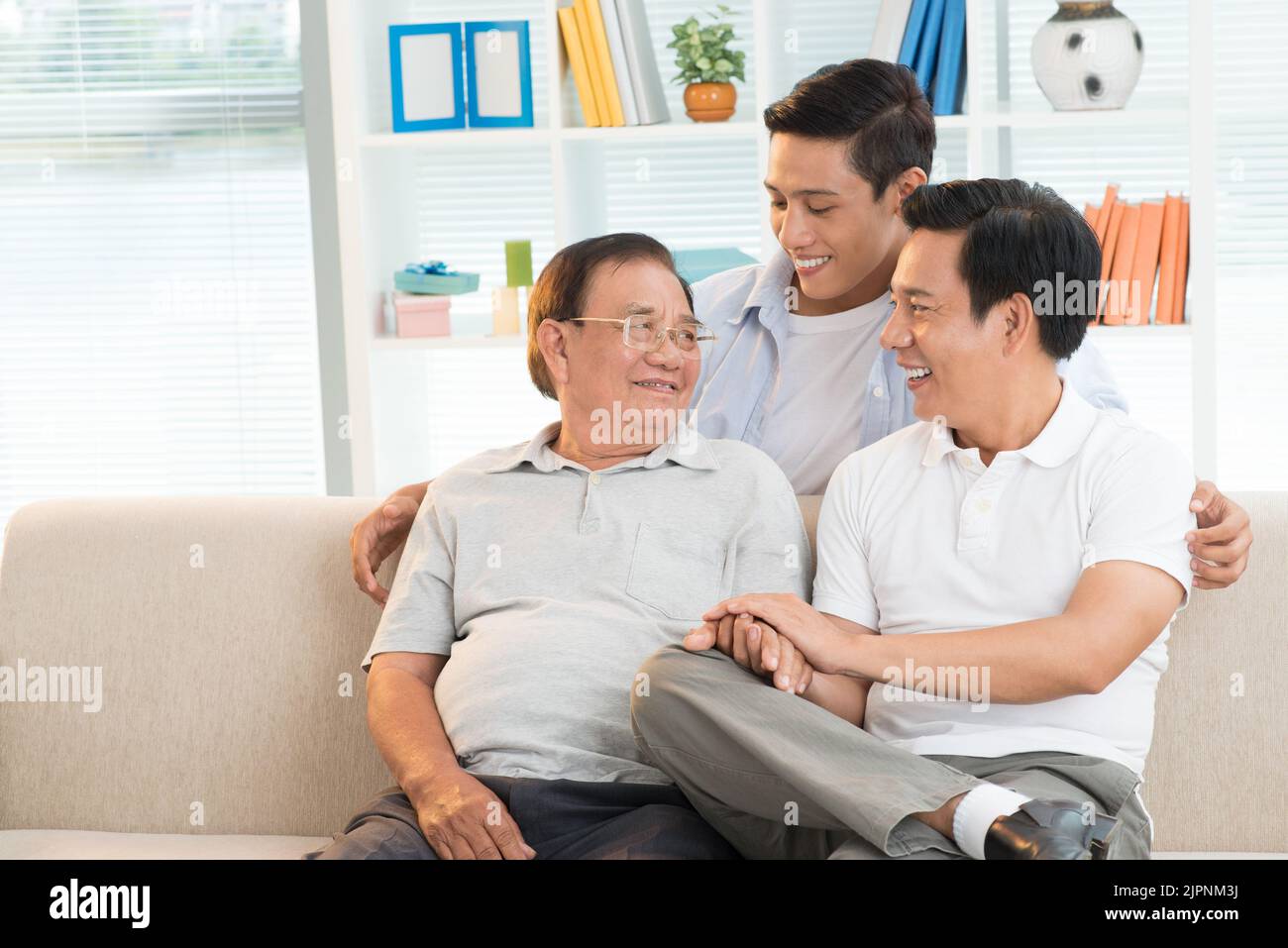 Male generation of family: grandfather, father and son Stock Photo - Alamy