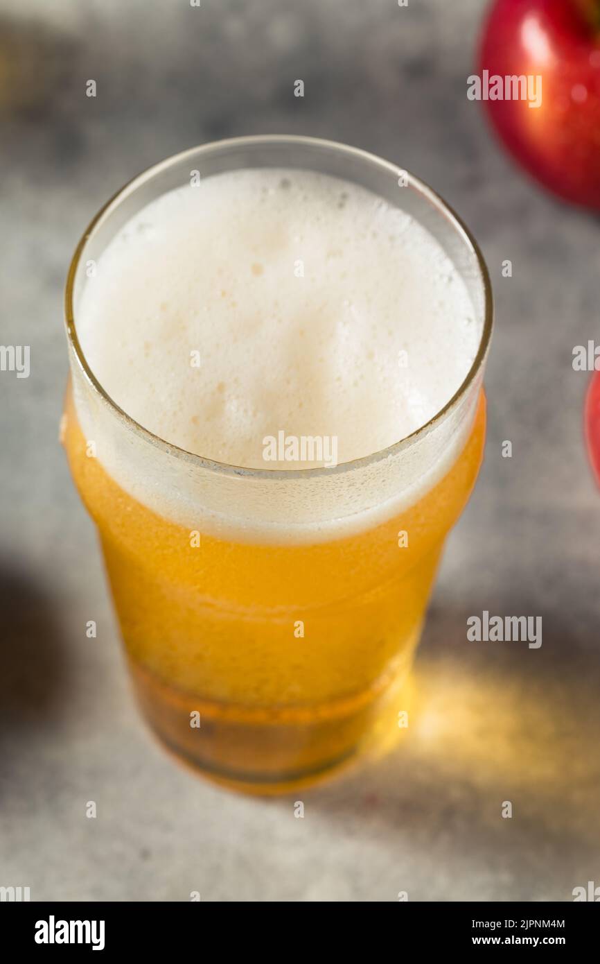 Boozy Refresing Cold Hard Apple Cider in a Pint Glass Stock Photo - Alamy