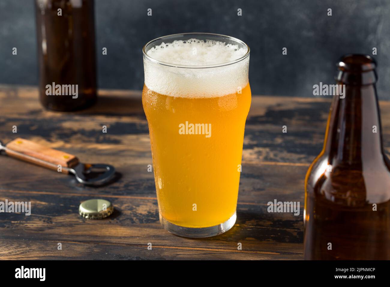 Cold Refreshing Boozy Farmhouse Ale Beer in a Pint Glass Stock Photo ...