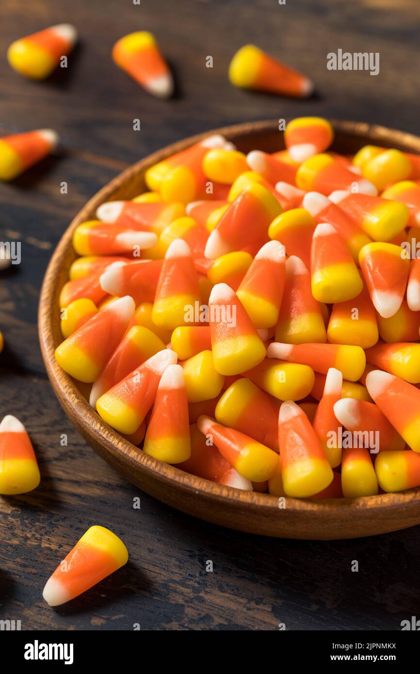 Sweet Halloween Candy Corn in a Bowl Ready to Eat Stock Photo - Alamy