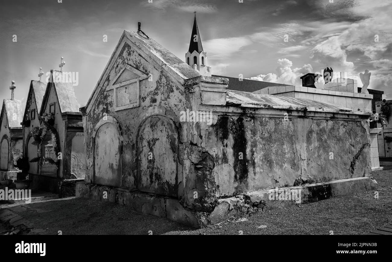 A greyscale shot of an old monument cemetery Stock Photo - Alamy