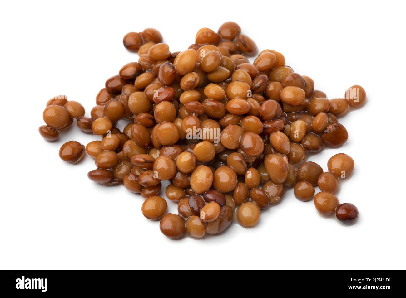 Heap of preserved steamed brown lentils close up isolated on white ...