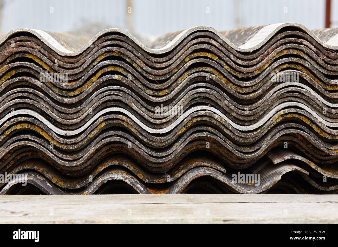 A stack of wave slate. Gray wavy slate. Slate Roofing. Home ...