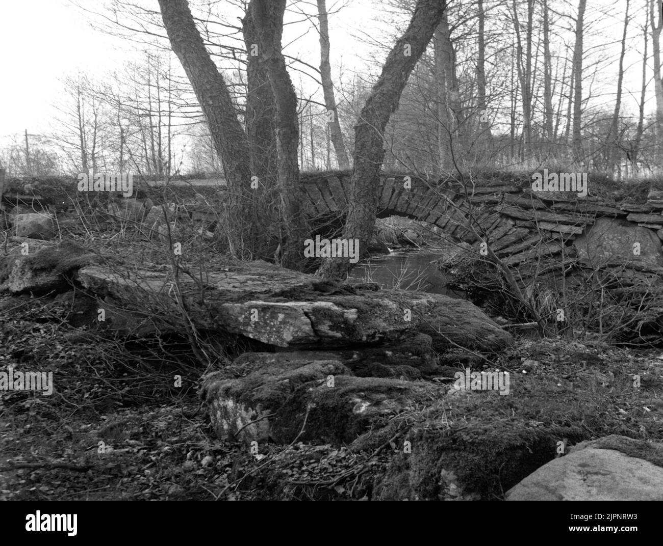 Old arched bridge above the church torn in 1959. Gammal välvd bro ...
