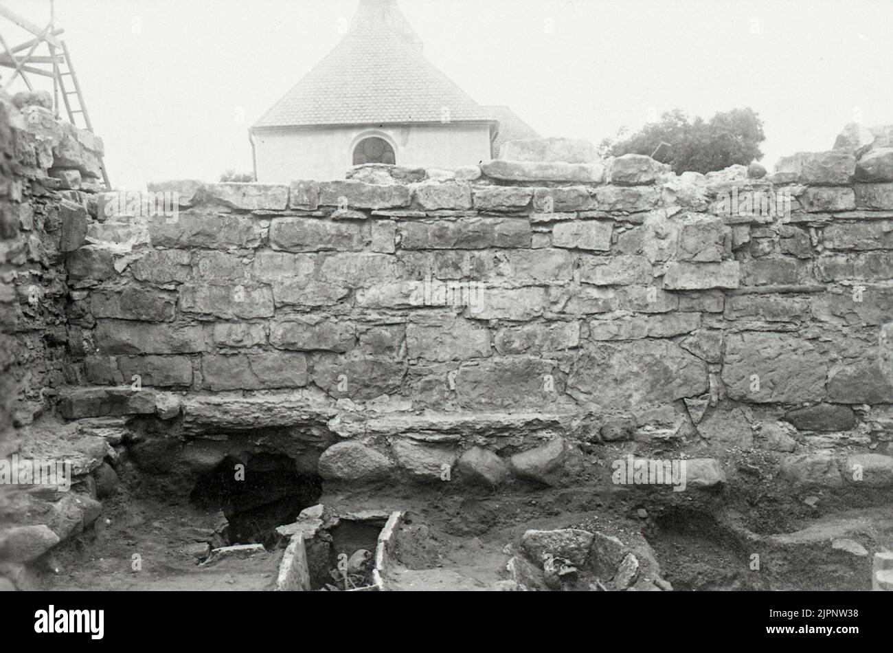 The chapter room. The east side of the west wall. At the arrow mass ...