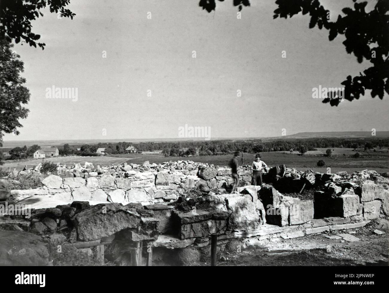 The Eastern House from South South West. Two men. Östra huset från ...