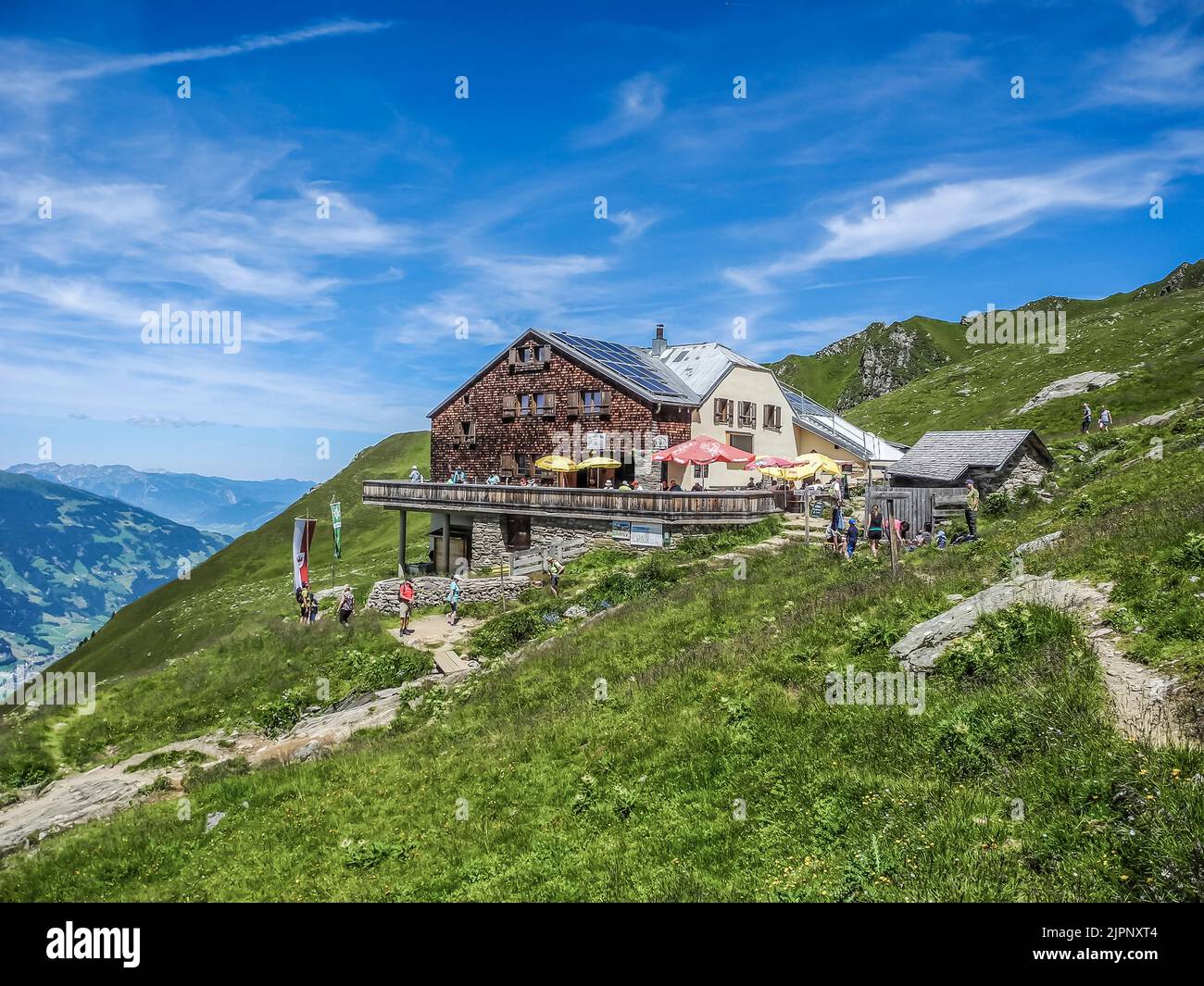 The image is of the Karl von Edel Hut mountain refuge above the resort ...