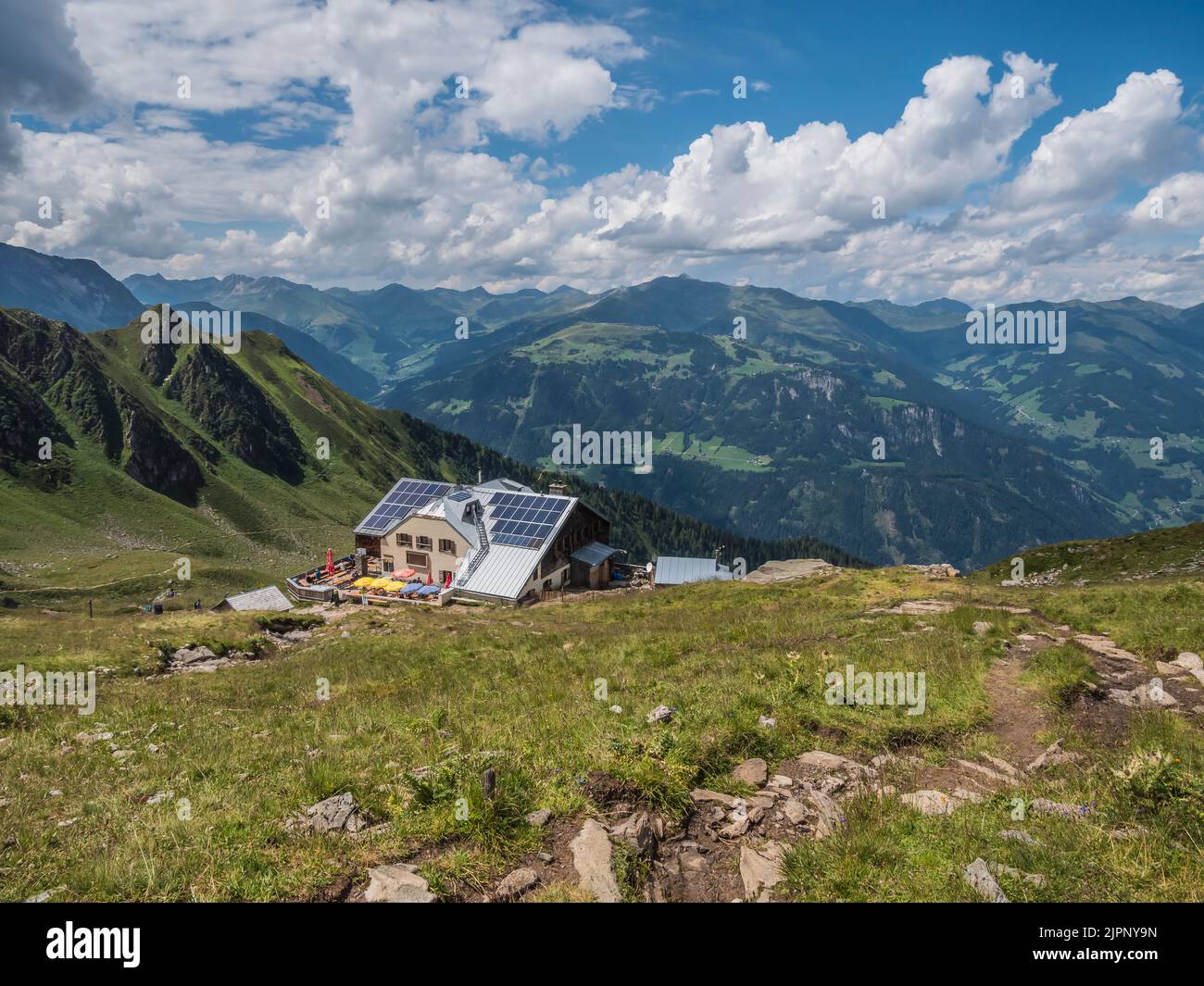 The image is of the Karl von Edel Hut mountain refuge above the resort ...