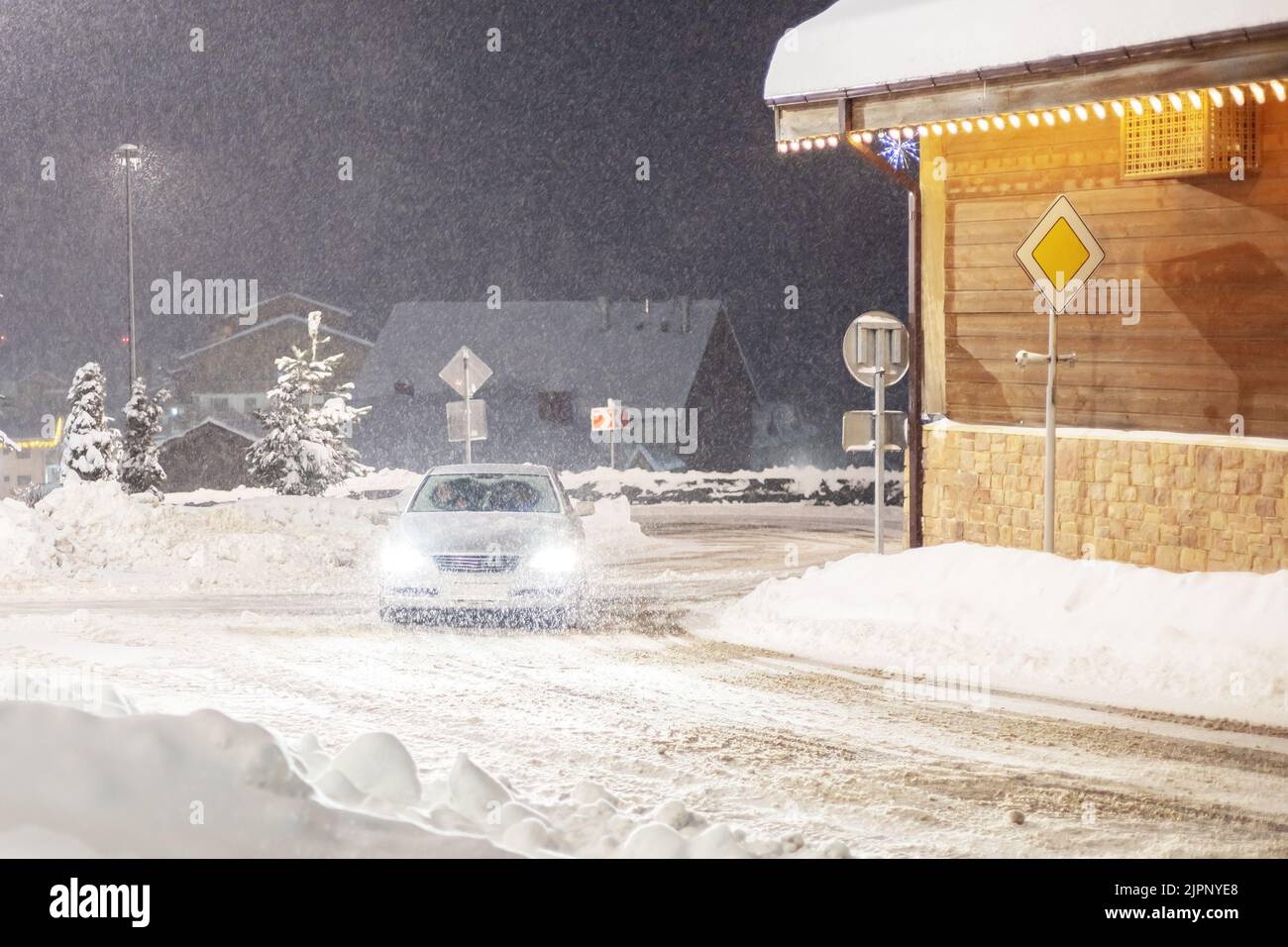 Driving in snow night village hi-res stock photography and images - Alamy