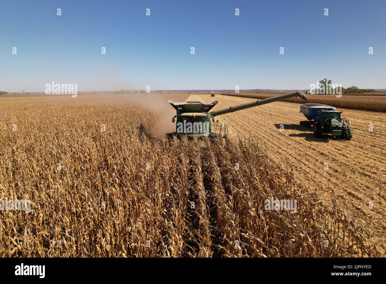 An aerial view of a large grain cart harvesting corn Stock Photo - Alamy