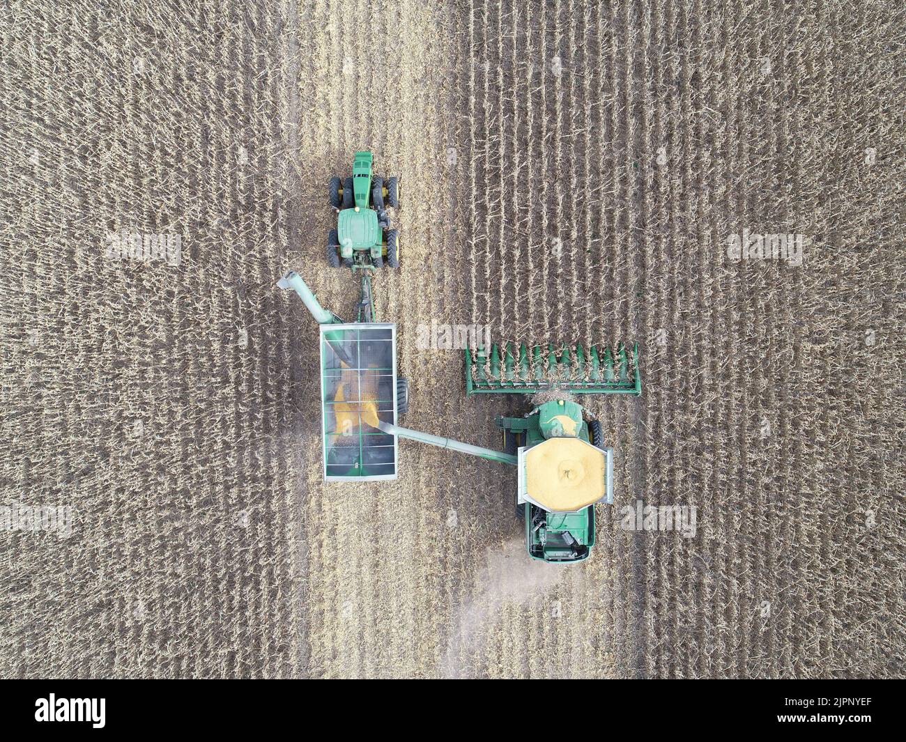 An aerial view of a large grain cart harvesting corn Stock Photo - Alamy