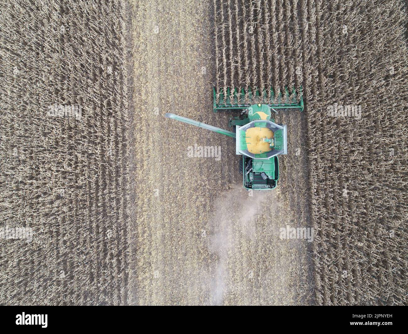 An aerial view of a large grain cart harvesting corn Stock Photo - Alamy