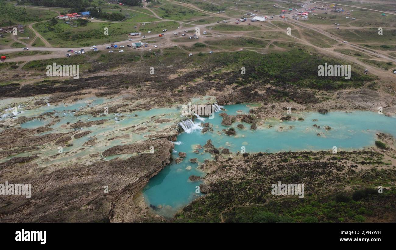 A rocky cliff overseeing the blue ocean on a sunny day Stock Photo - Alamy
