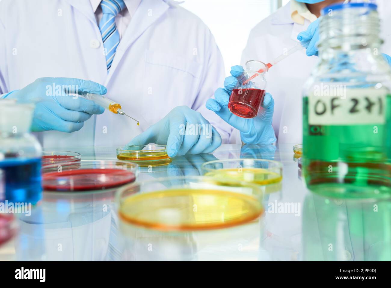 Working process at modern laboratory: team of talented researchers ...