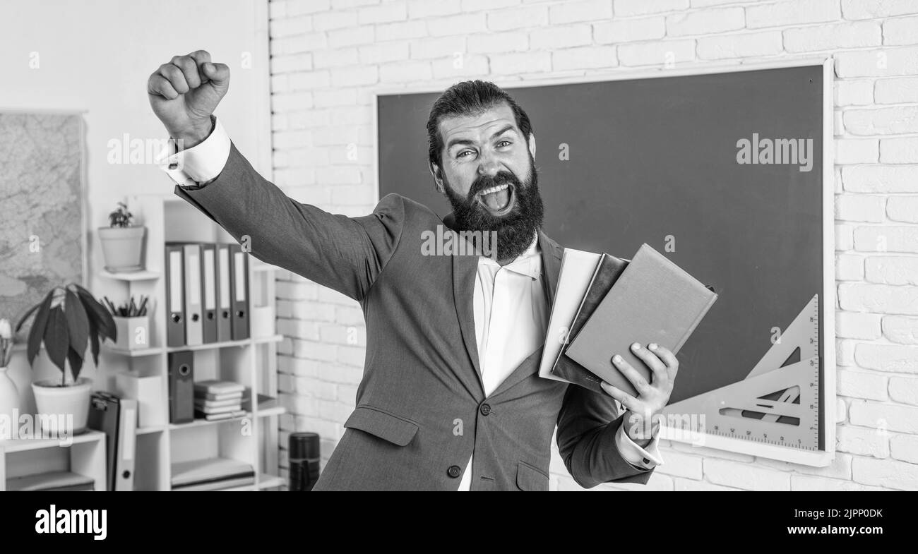 happy man with workbook and books ready for lesson, school Stock Photo ...