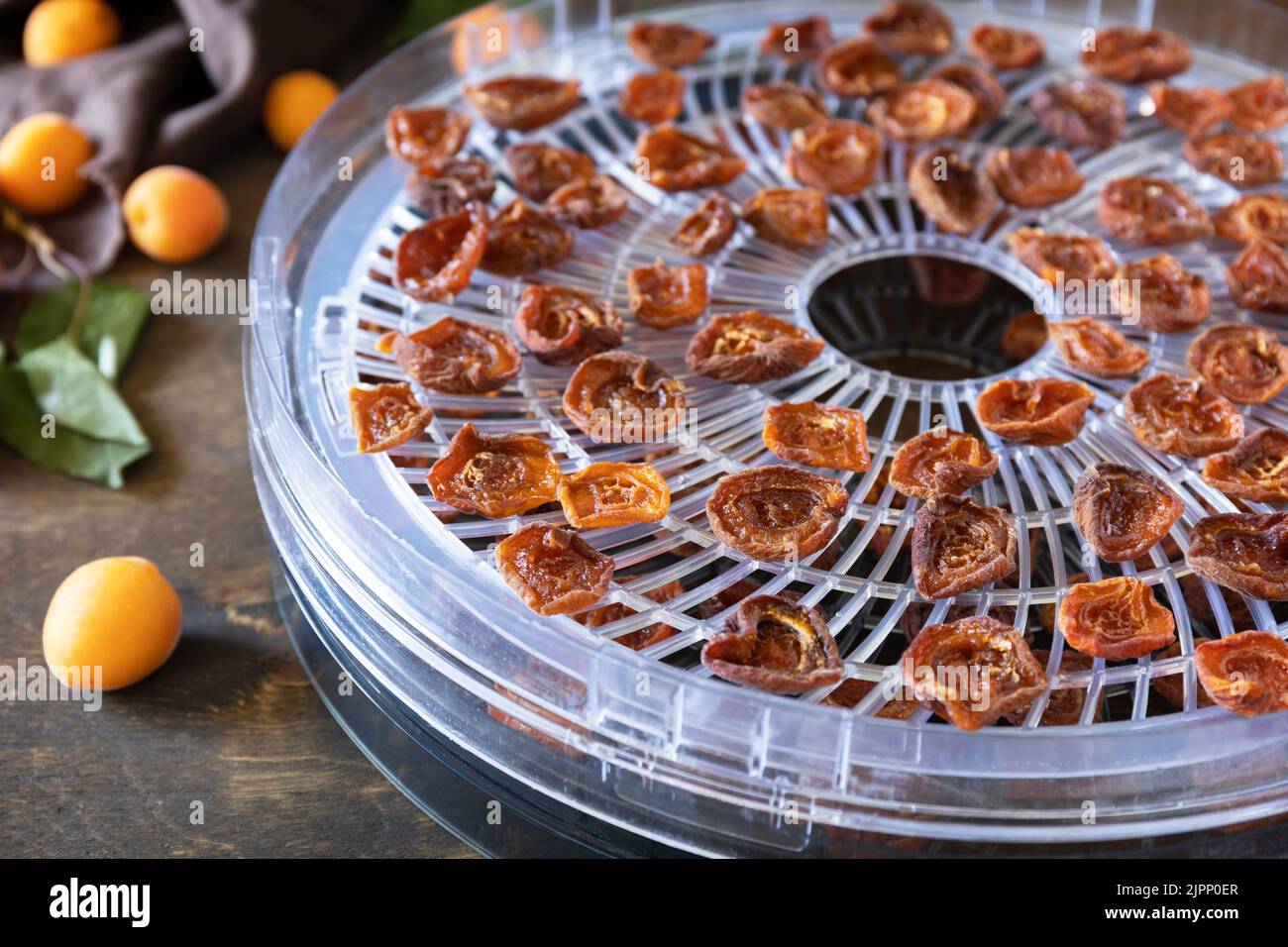 The process of home cooking dried fruits or candied fruit in an ...