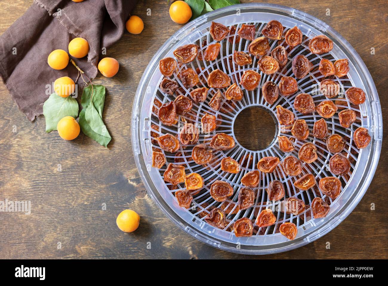 The process of home cooking dried fruits or candied fruit in an ...