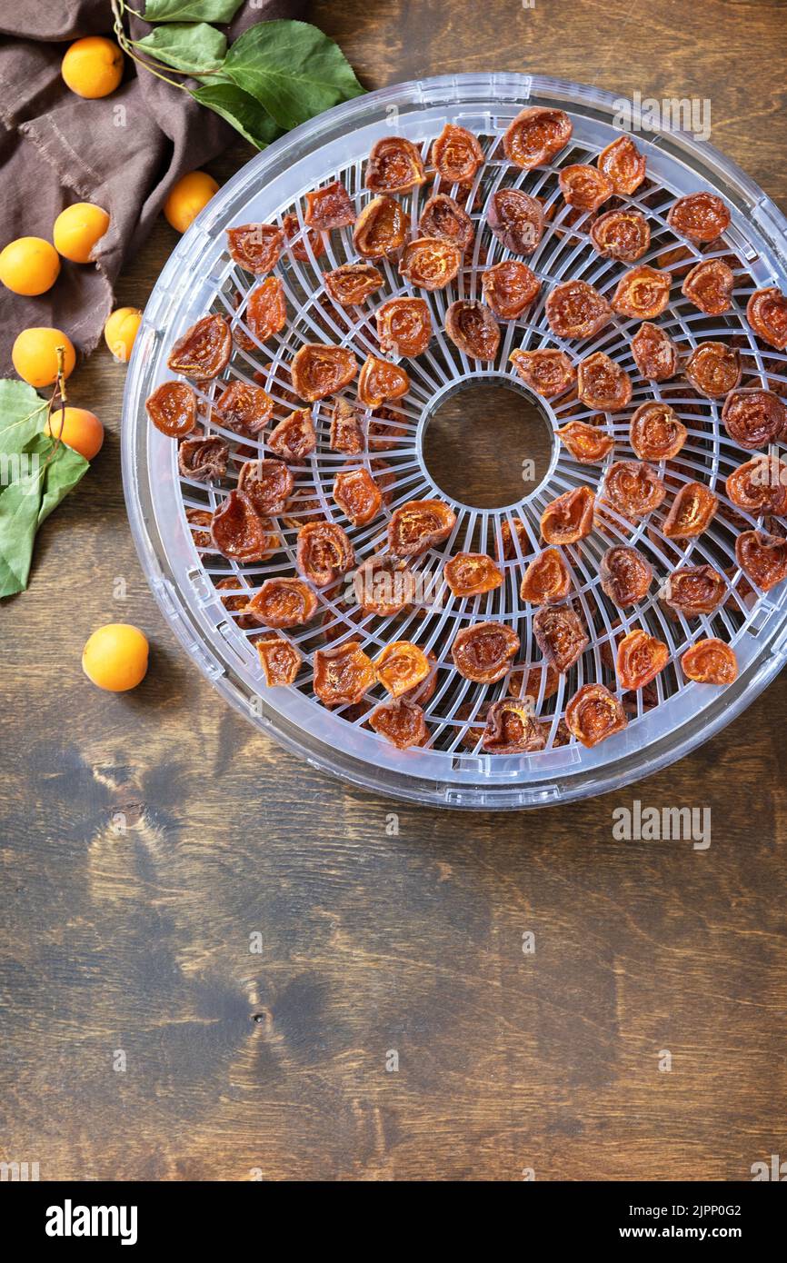 The process of home cooking dried fruits or candied fruit in an ...