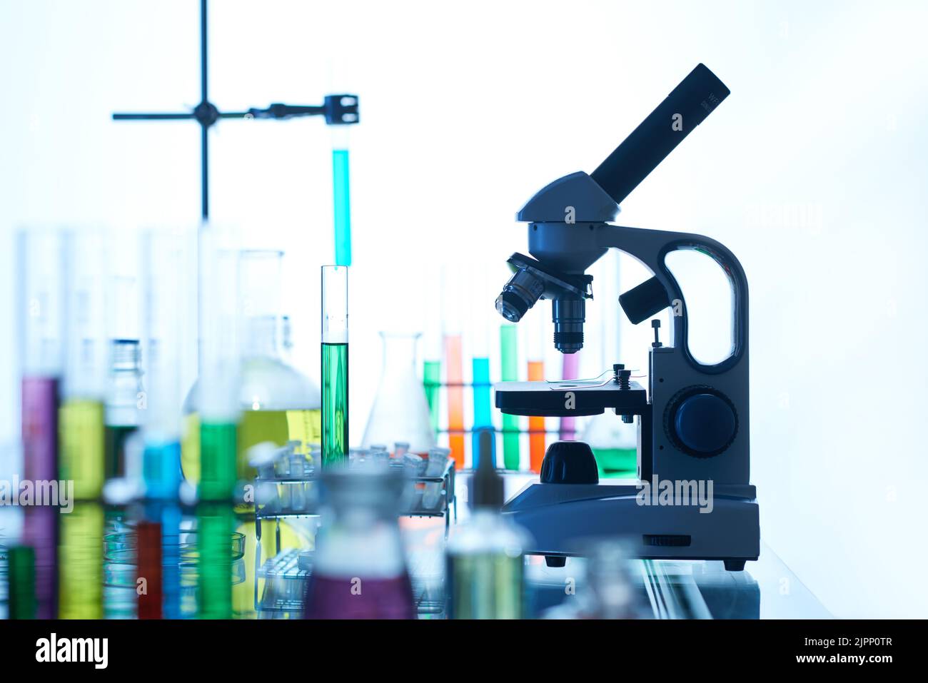 Laboratory interior: test tubes and flasks with colorful liquids ...