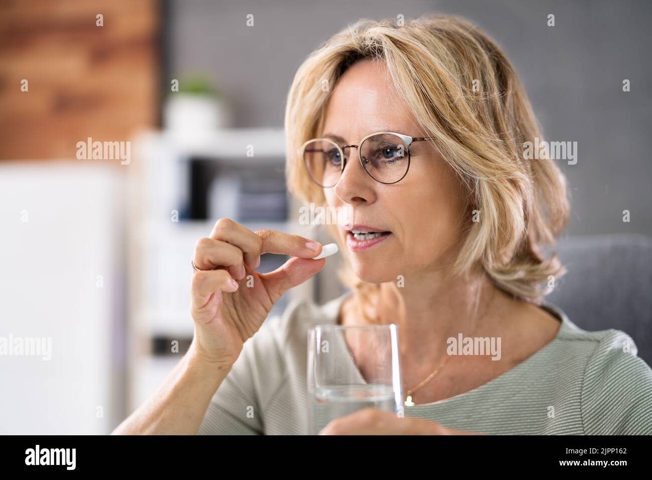 Take Medication Pill. Medical Tablet And Water Against Pain Stock Photo ...