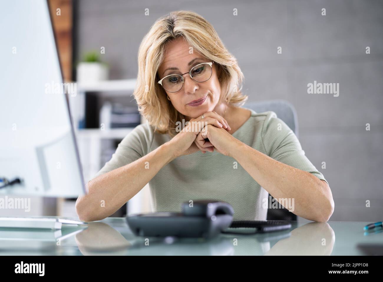 Waiting Landline Telephone Or Phone Call At Office Desk Stock Photo - Alamy