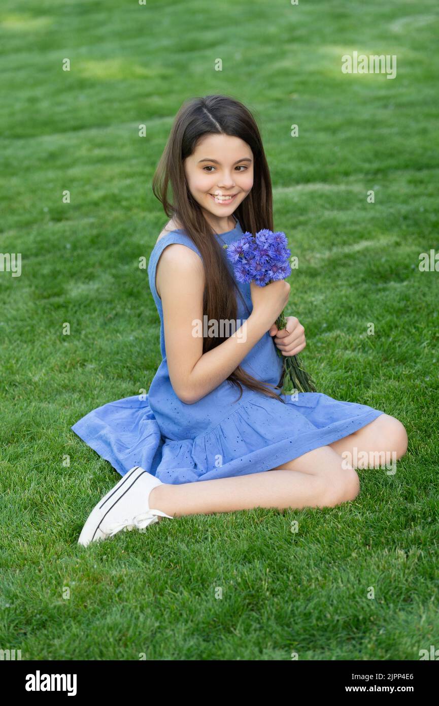 teen girl smile with flowers. pretty girl with spring bouquet. cute girl portrait Stock Photo ...