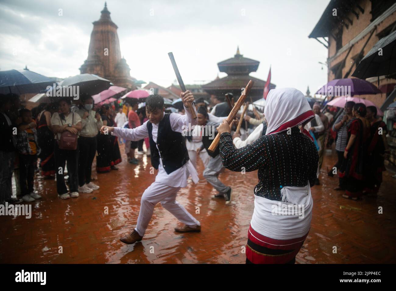 Bhaktapur, Nepal. 19th Aug, 2022. Devotees in traditional attires ...
