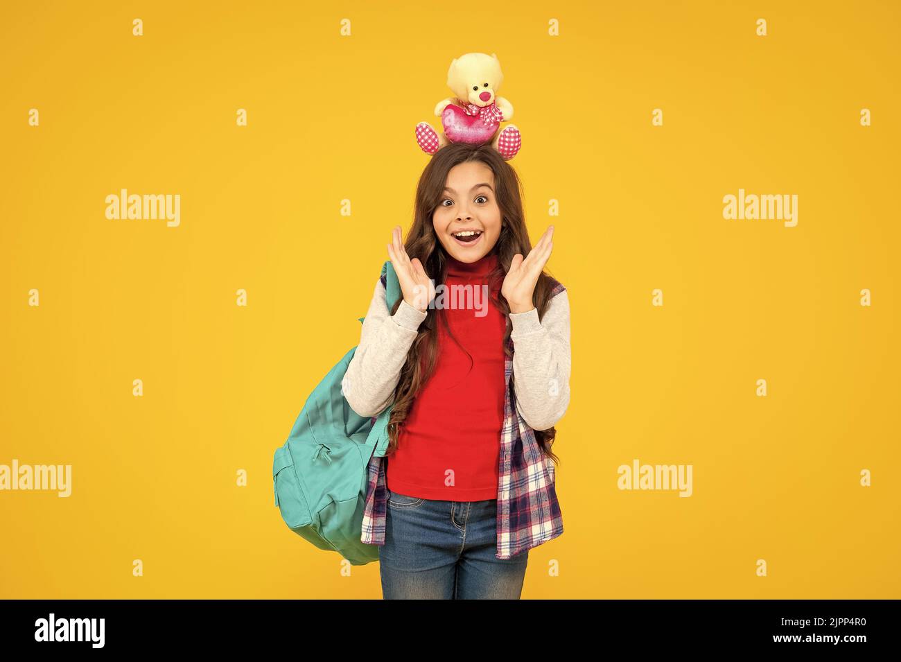 knowledge day. concept of education. kid in casual clothes on yellow ...