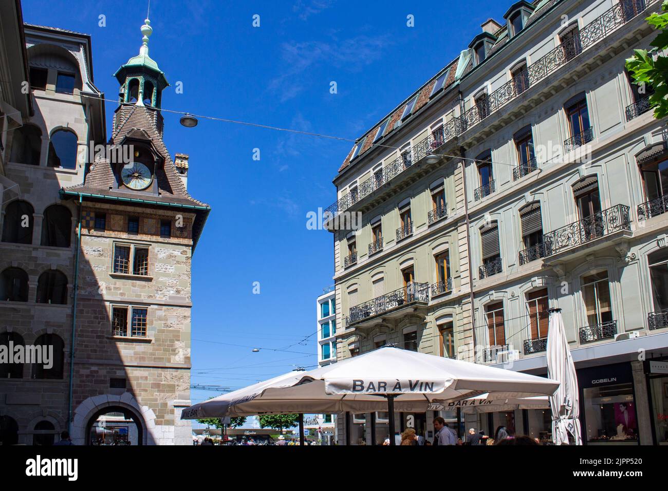 The Geneva Molard clock Tower in downtown Geneva, Switzerland Stock ...