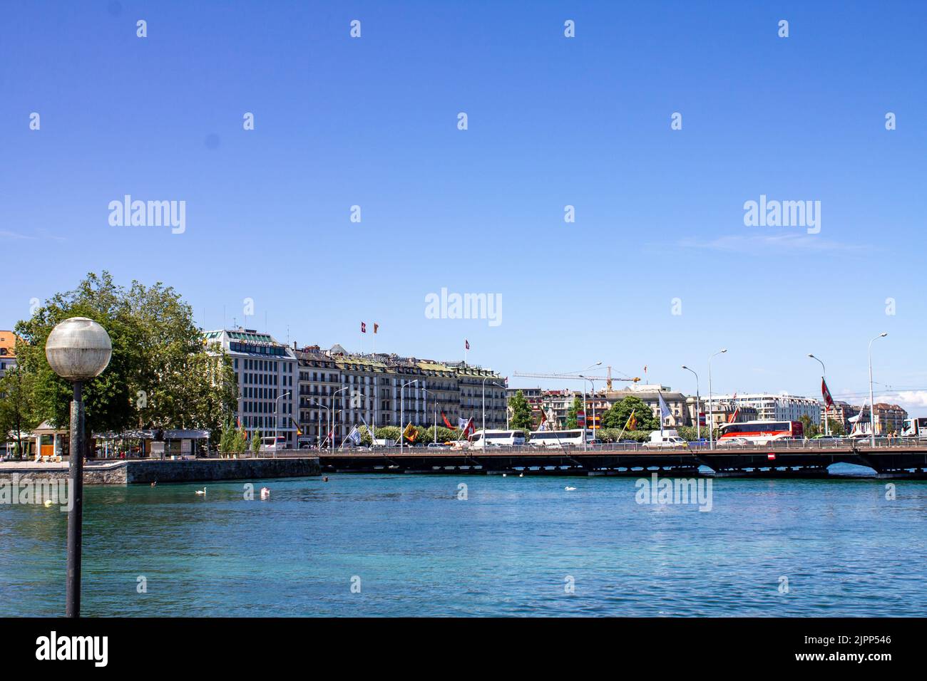 The facade of the typical historical building in Geneva at the shore of ...