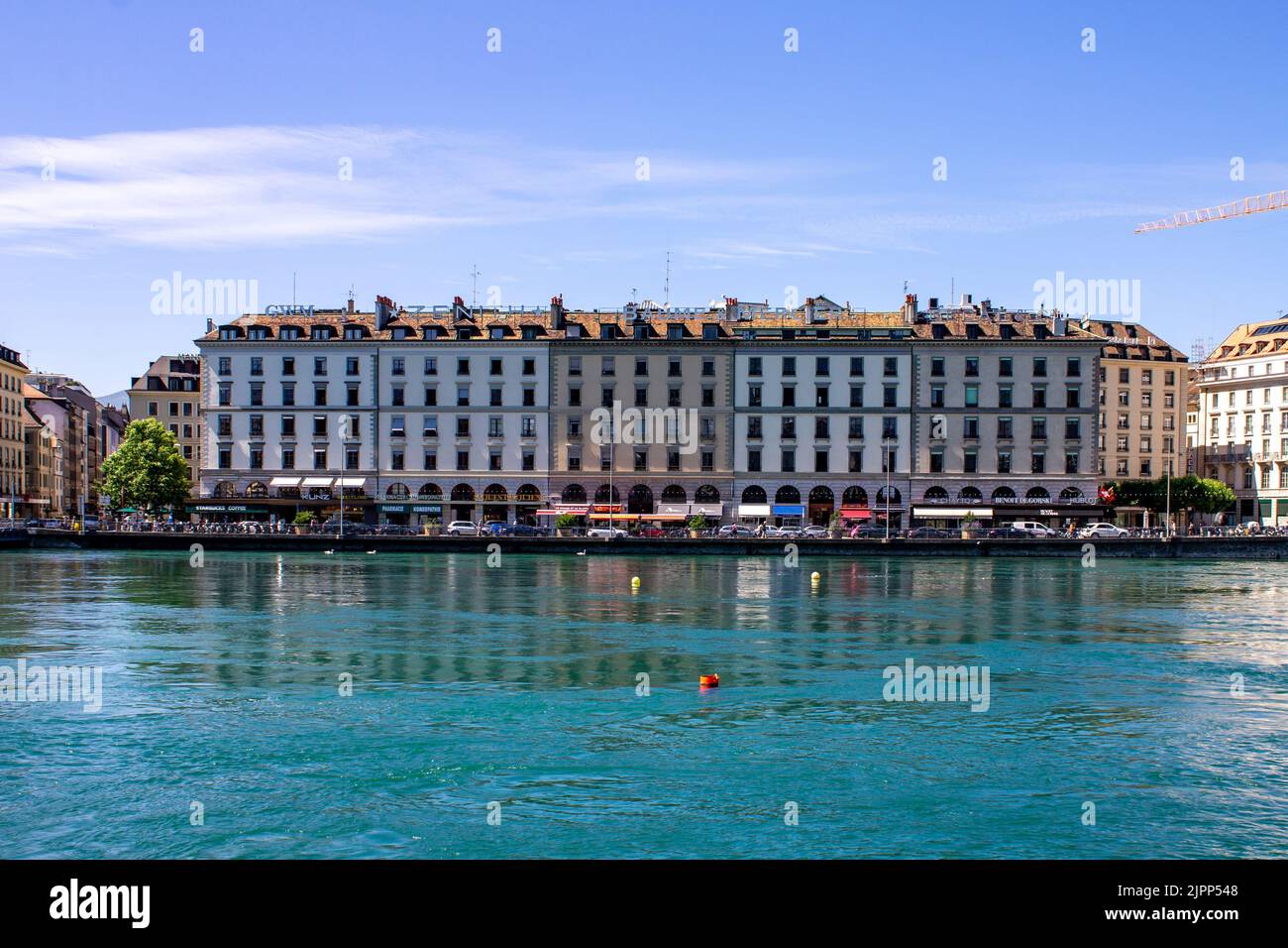 The facade of the typical historical building in Geneva at the shore of ...