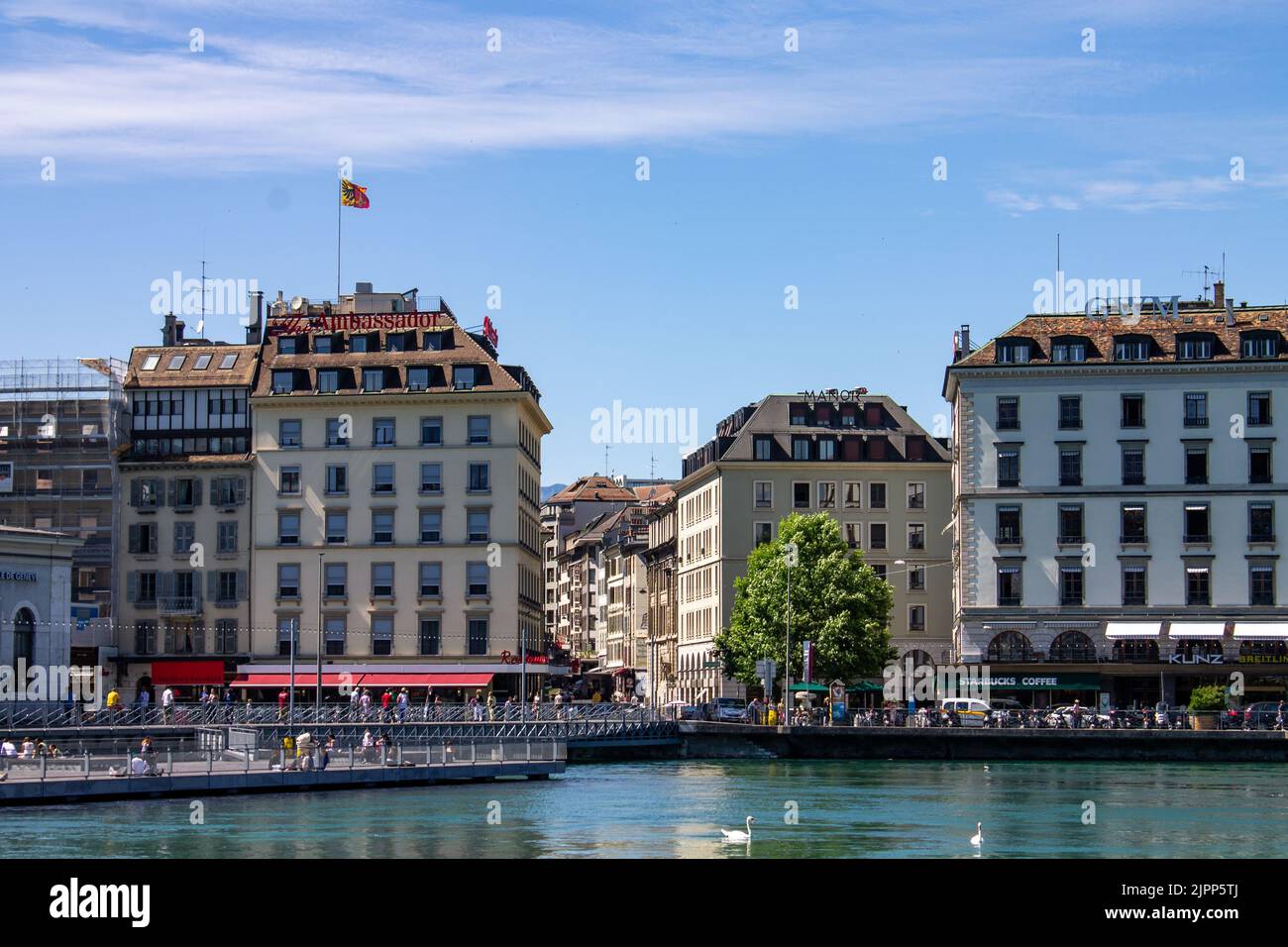 The facade of the typical historical building in Geneva at the shore of ...