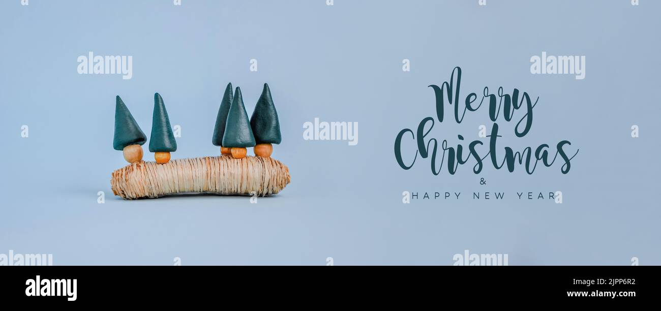 Happy New Year and Merry Christmas poster. Christmas scene with trees ...
