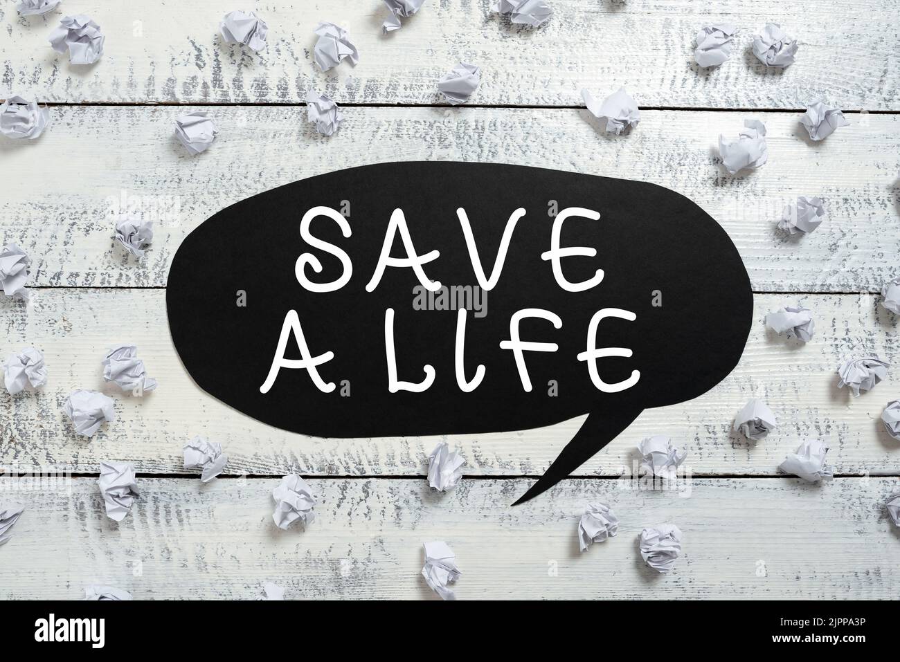 Sign displaying Save A Life, Word Written on Help assistance saving ...