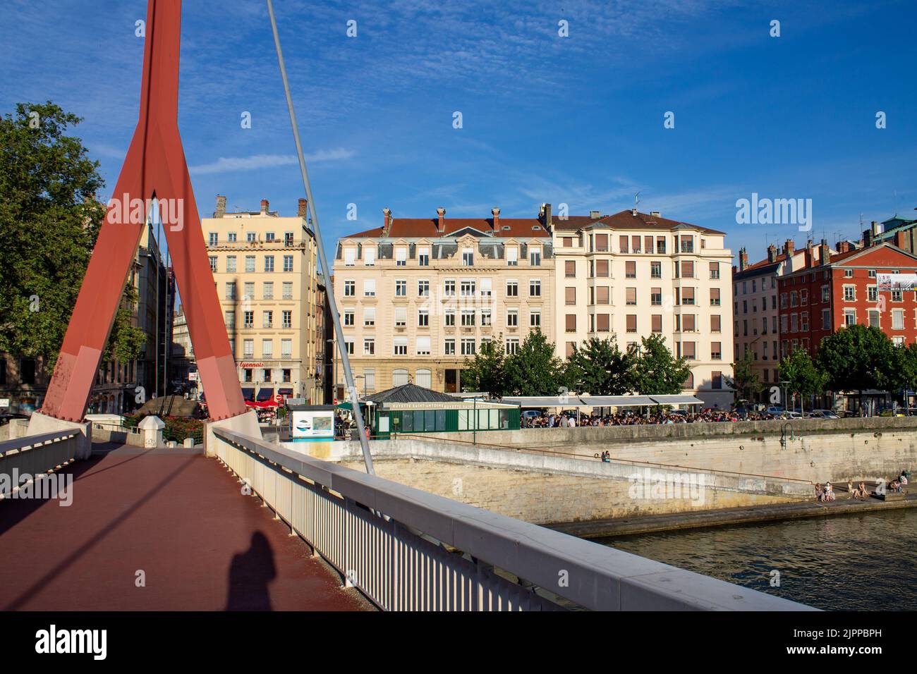 The Passerelle du Palais de Justice pedestrian bridge over Saone river ...