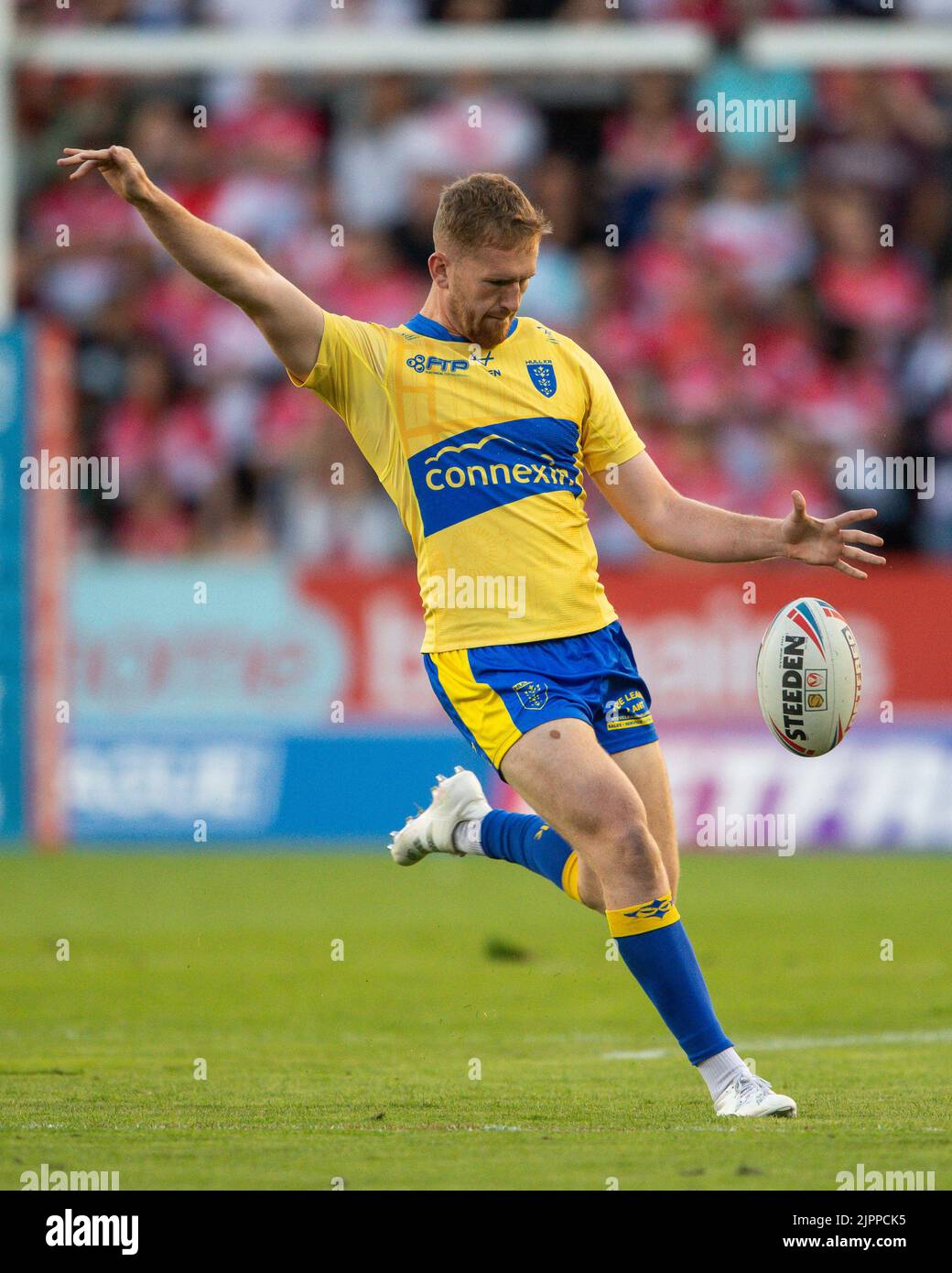 Rowan Milnes #21 of Hull KR kicks ahead Stock Photo - Alamy