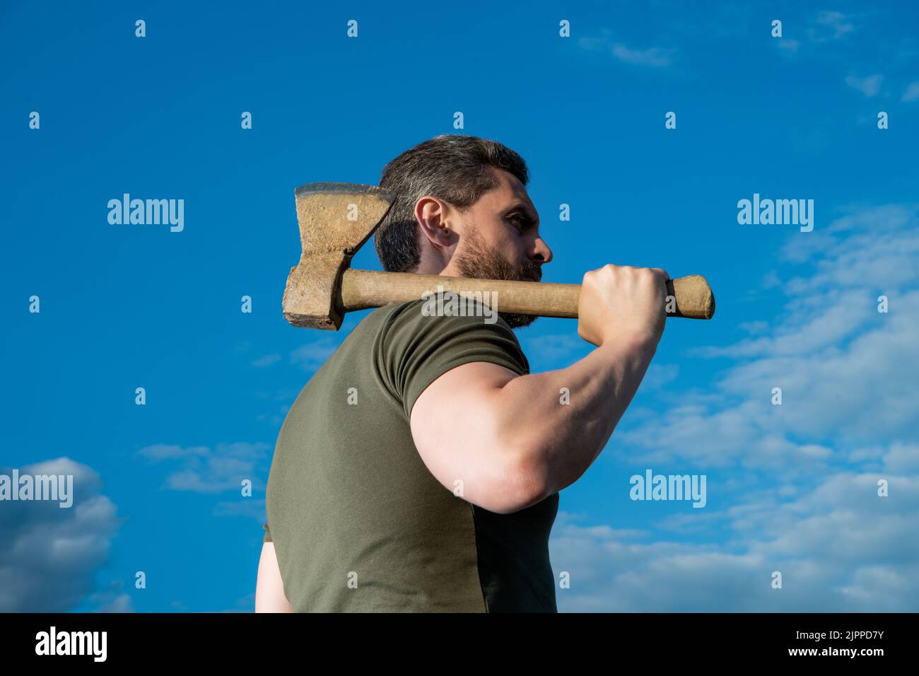 back view of man with axe. woodman man hold ax. brutal man on sky ...