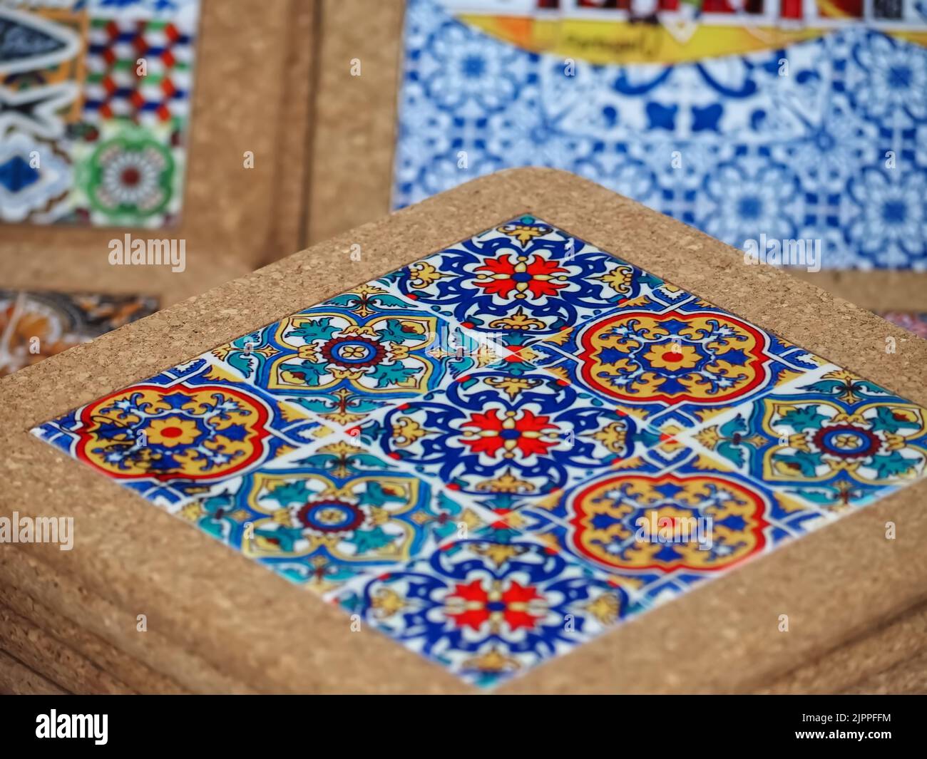 Portuguese gifts - mats of cork with tiles Stock Photo - Alamy