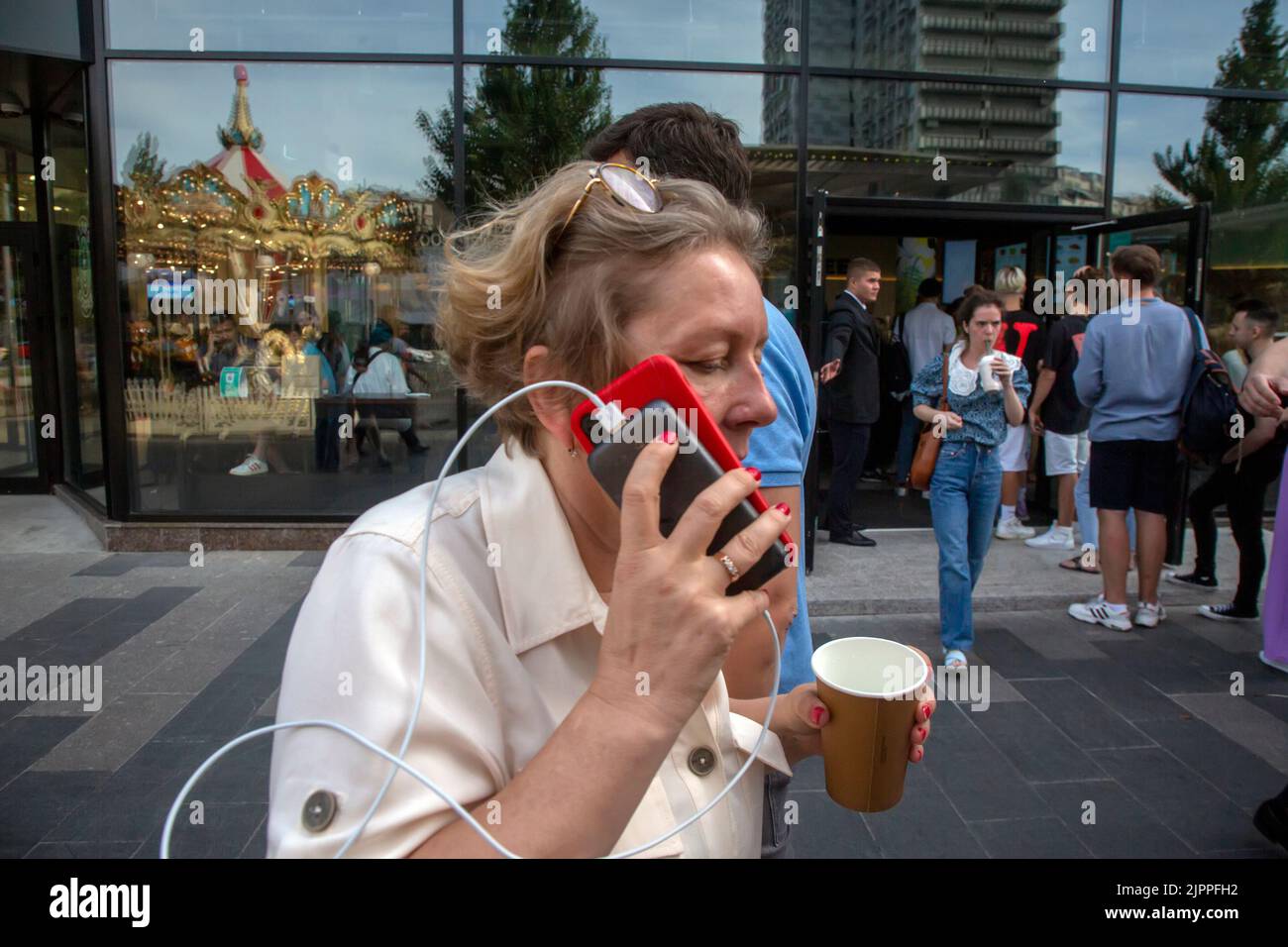 Moscow, Russia. 19th of August, 2022. People are seen at an entrance of ...