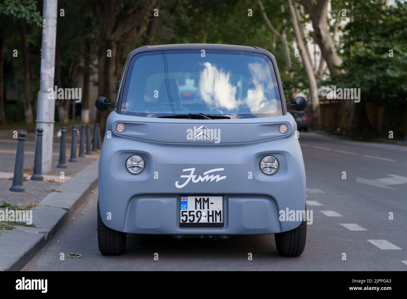 Electric Citroen Ami micro car zero emission parked. Modern 2-passenger ...