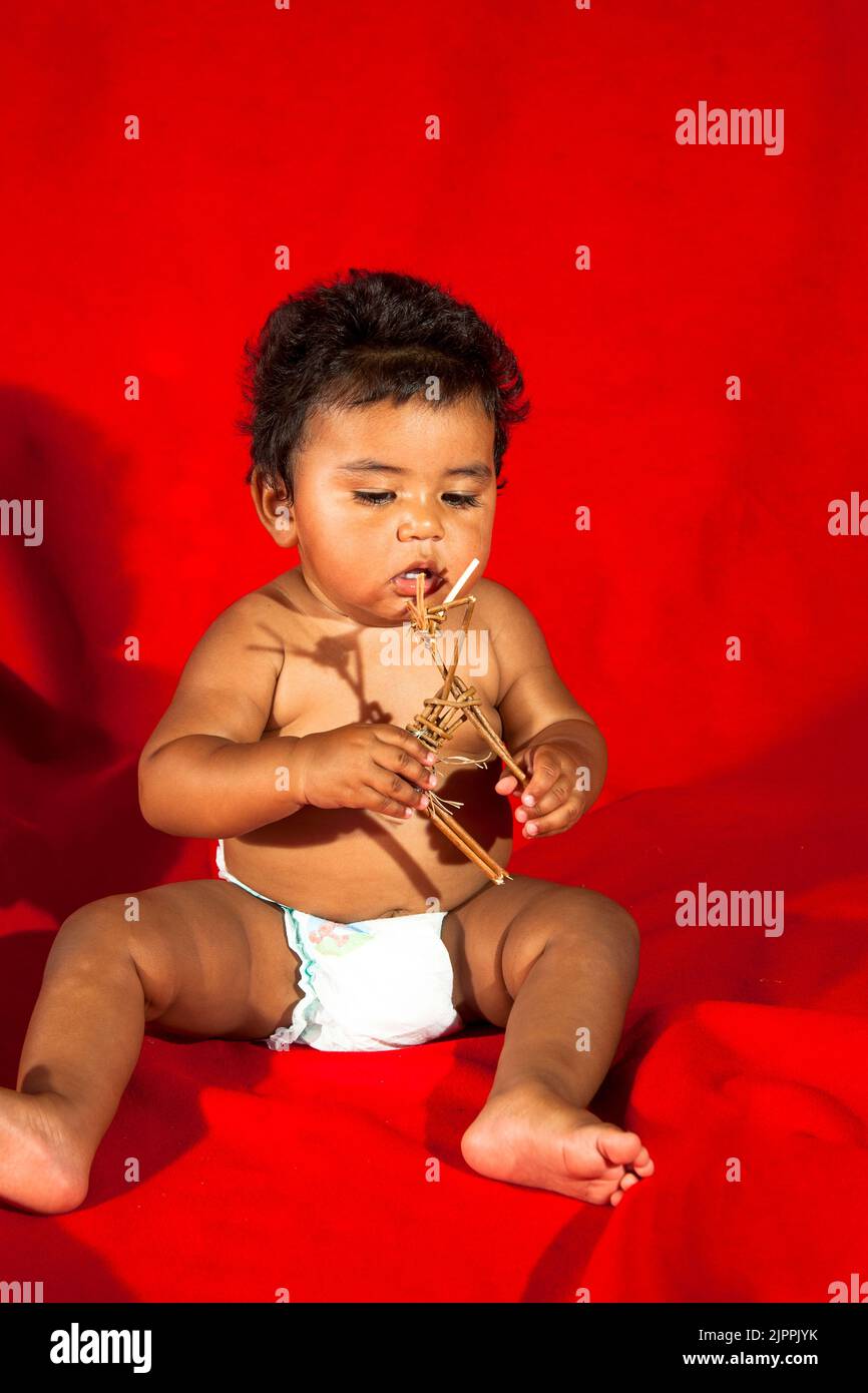 Native American baby, from the Santa Clara Pueblo in New Mexico, plays ...